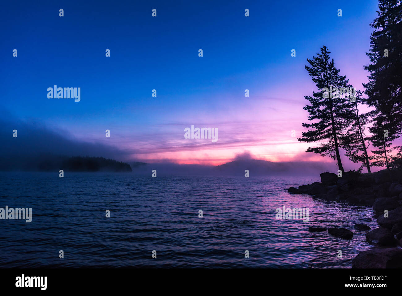 Stunning image of the foggy lake. Dramatic morning sunrise scene Stock ...