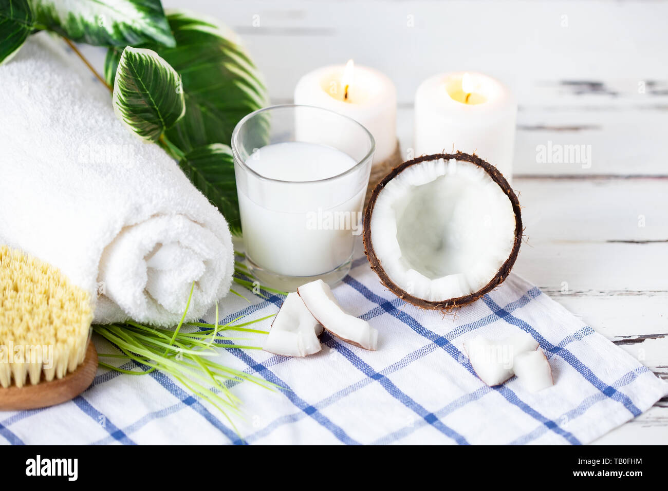 Relax and spa theme. Coconut, coconut oil, milk, candles, towel ...