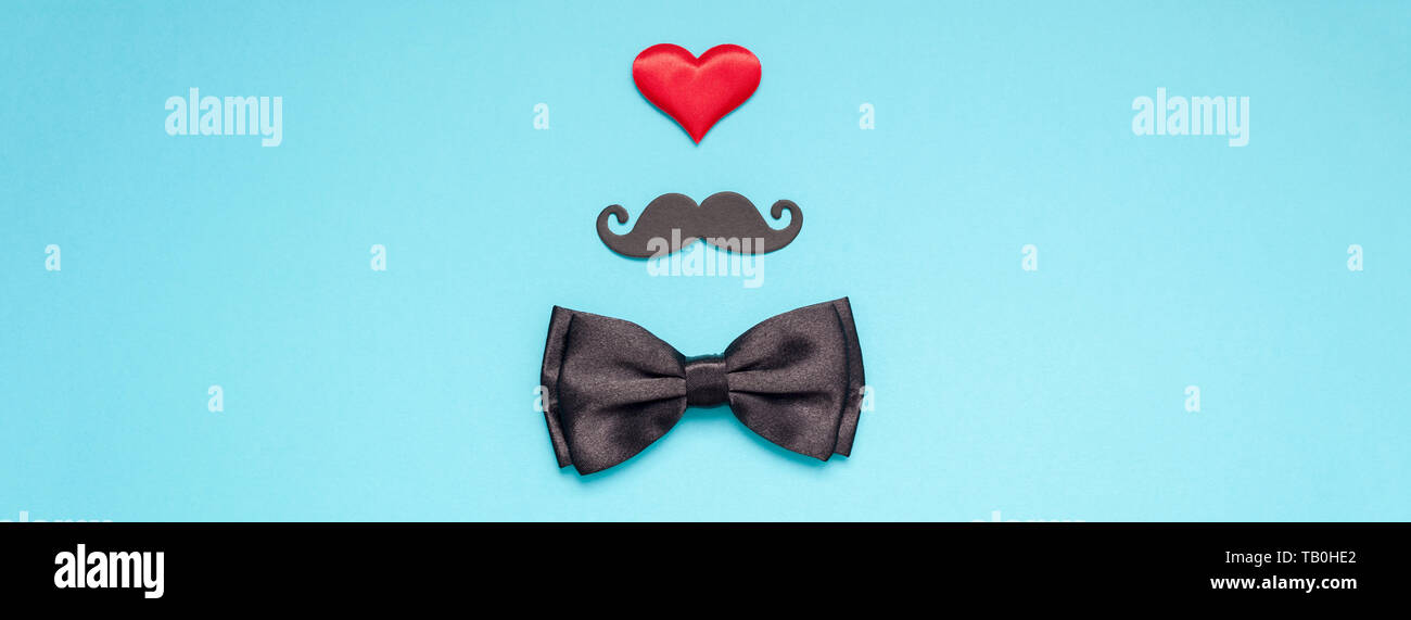 Creative flatlay overhead top view retro stylish black paper moustaches ...