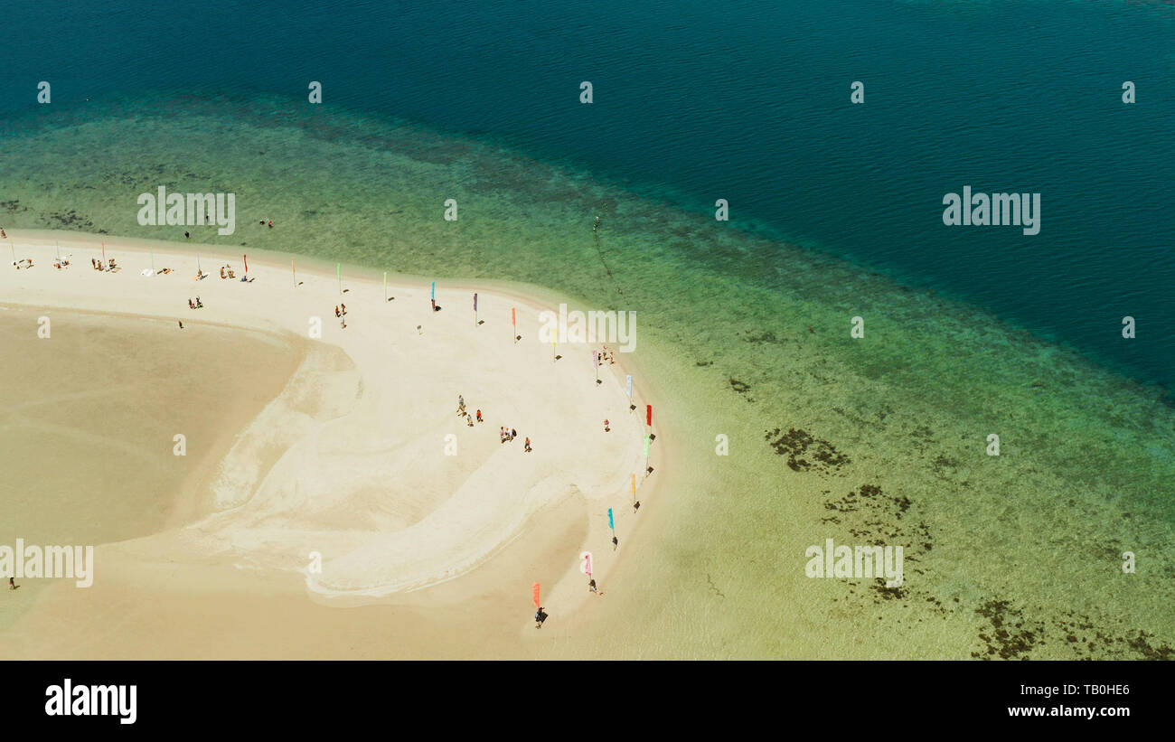 Beautiful beach on tropical island surrounded by coral reef, sandy bar ...