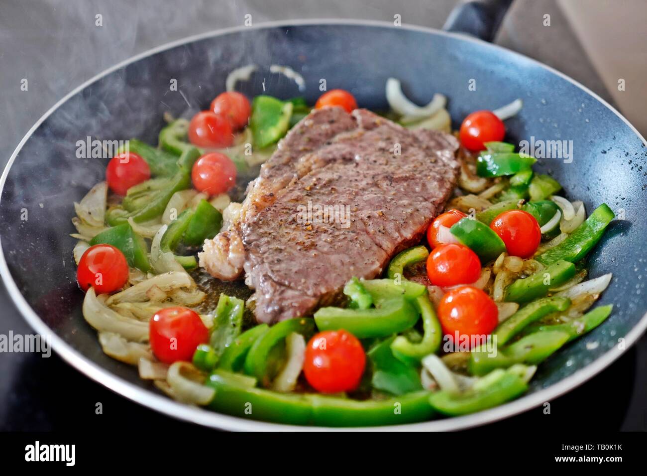 fresh cooking at home a roasted steak with vegetable Stock Photo - Alamy