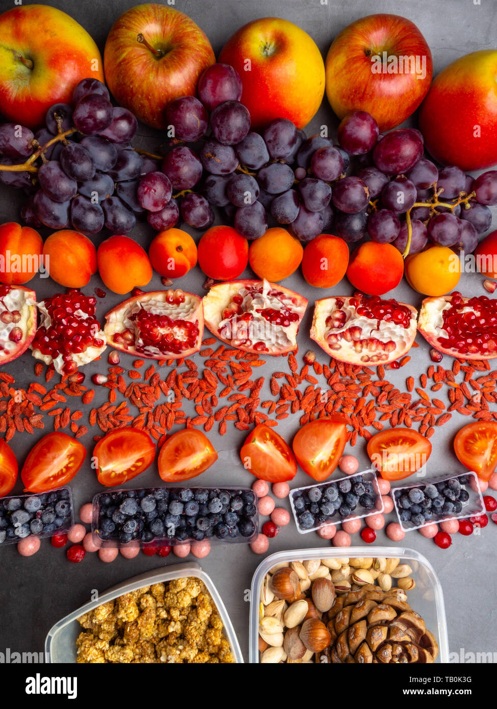 Healthy food clean eating selection: fruits,, superfood, nuts on gray ...