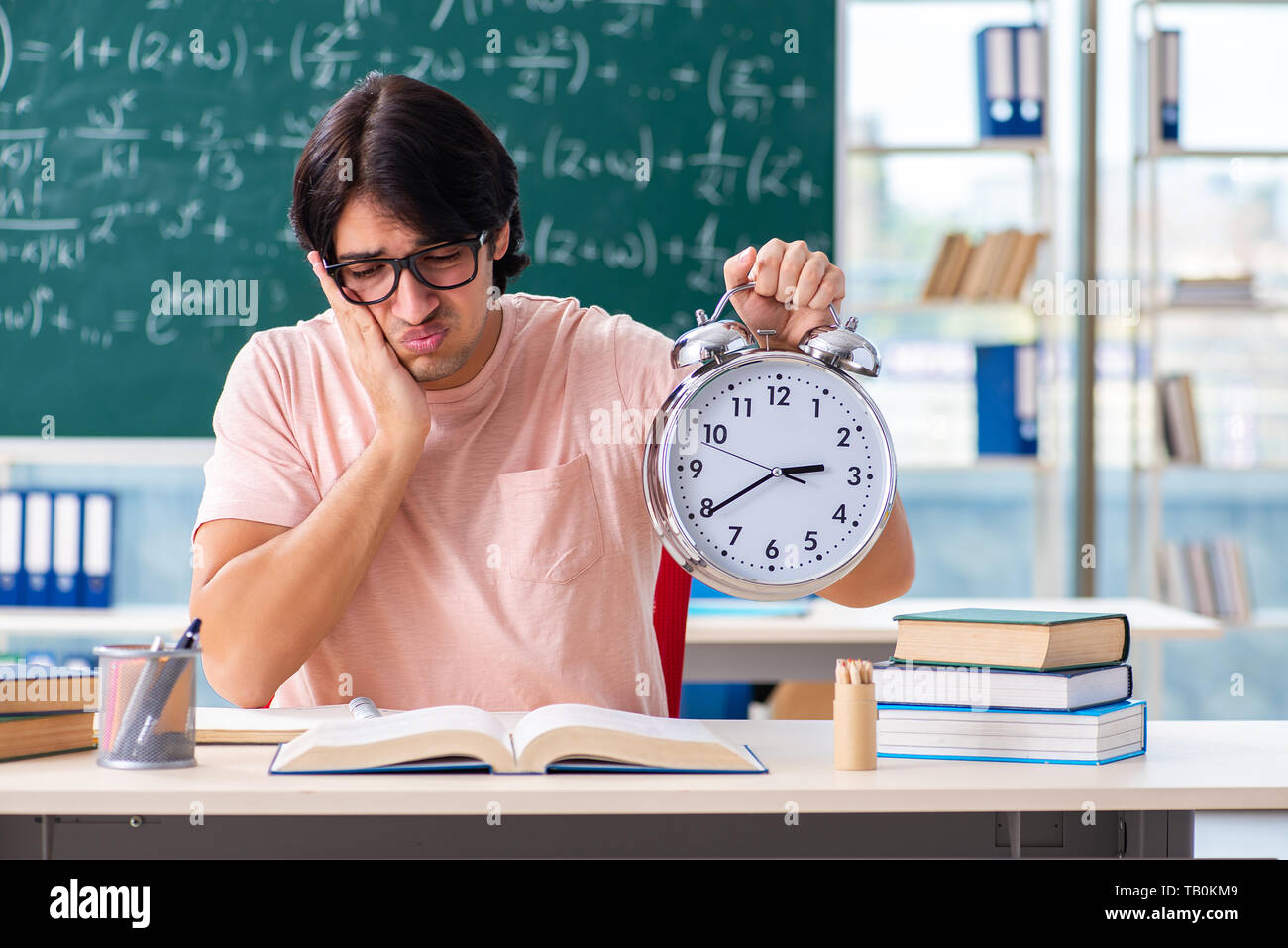 Student missing in classroom hi-res stock photography and images - Alamy
