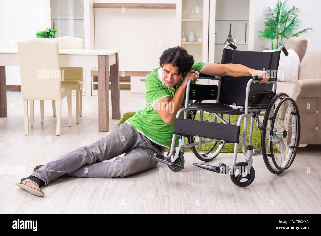 Fall falling wheelchair disabled hi-res stock photography and images ...