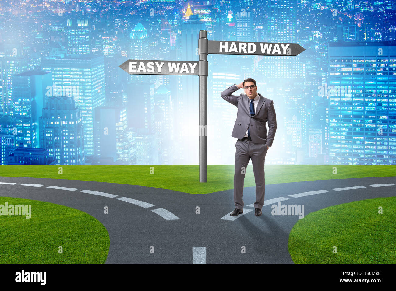 Businessman choosing between hard and easy way Stock Photo - Alamy