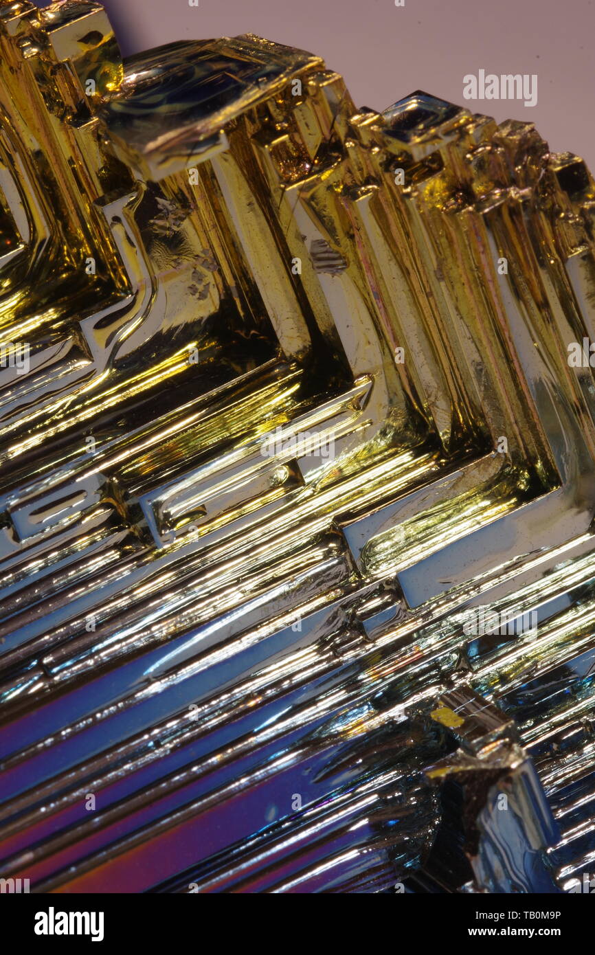 Bismuth Crystal against a Black Background Stock Photo - Alamy