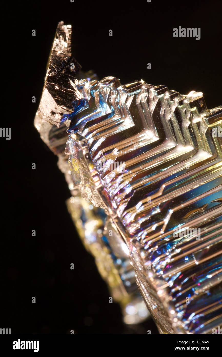 Bismuth Crystal against a Black Background Stock Photo - Alamy