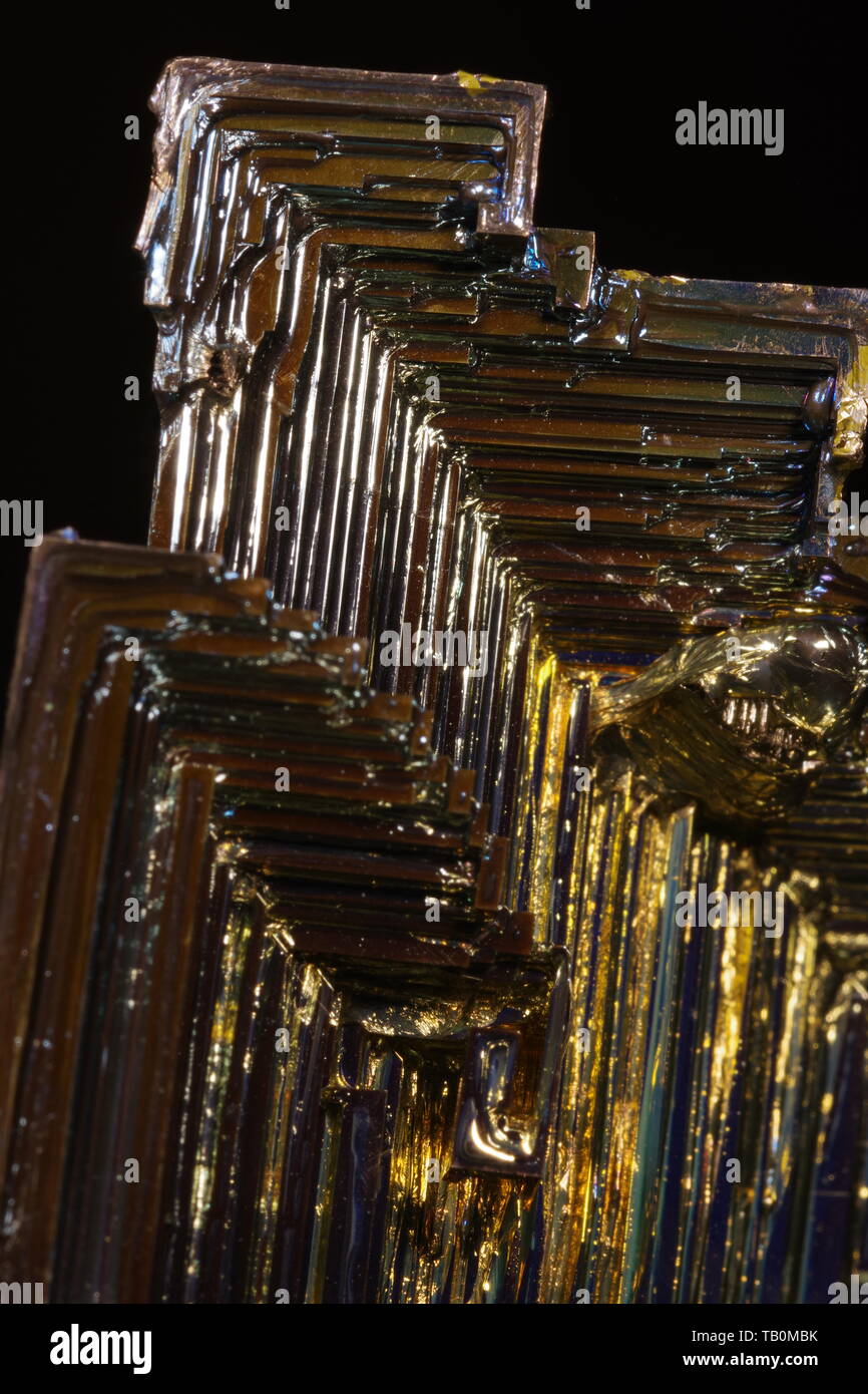 Bismuth Crystal against a Black Background Stock Photo - Alamy