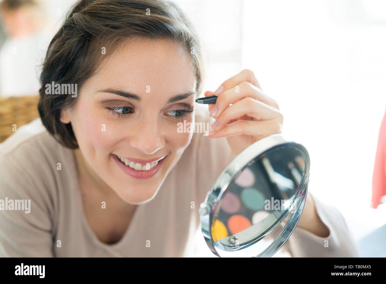 Eyebrow threading hi-res stock photography and images - Alamy