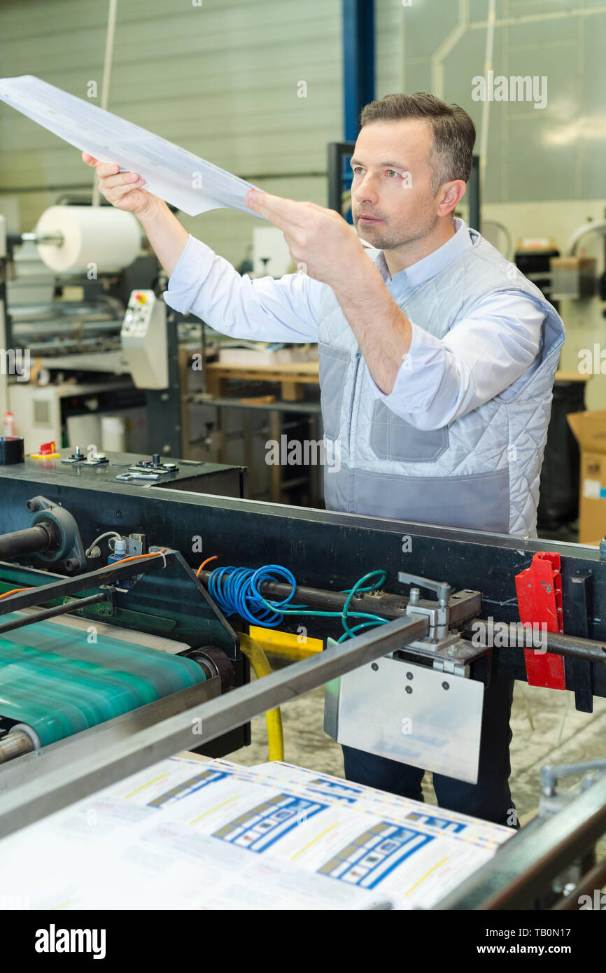 printing press worker Stock Photo - Alamy