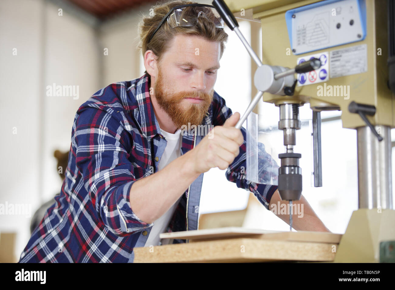 using a large milling machine Stock Photo - Alamy