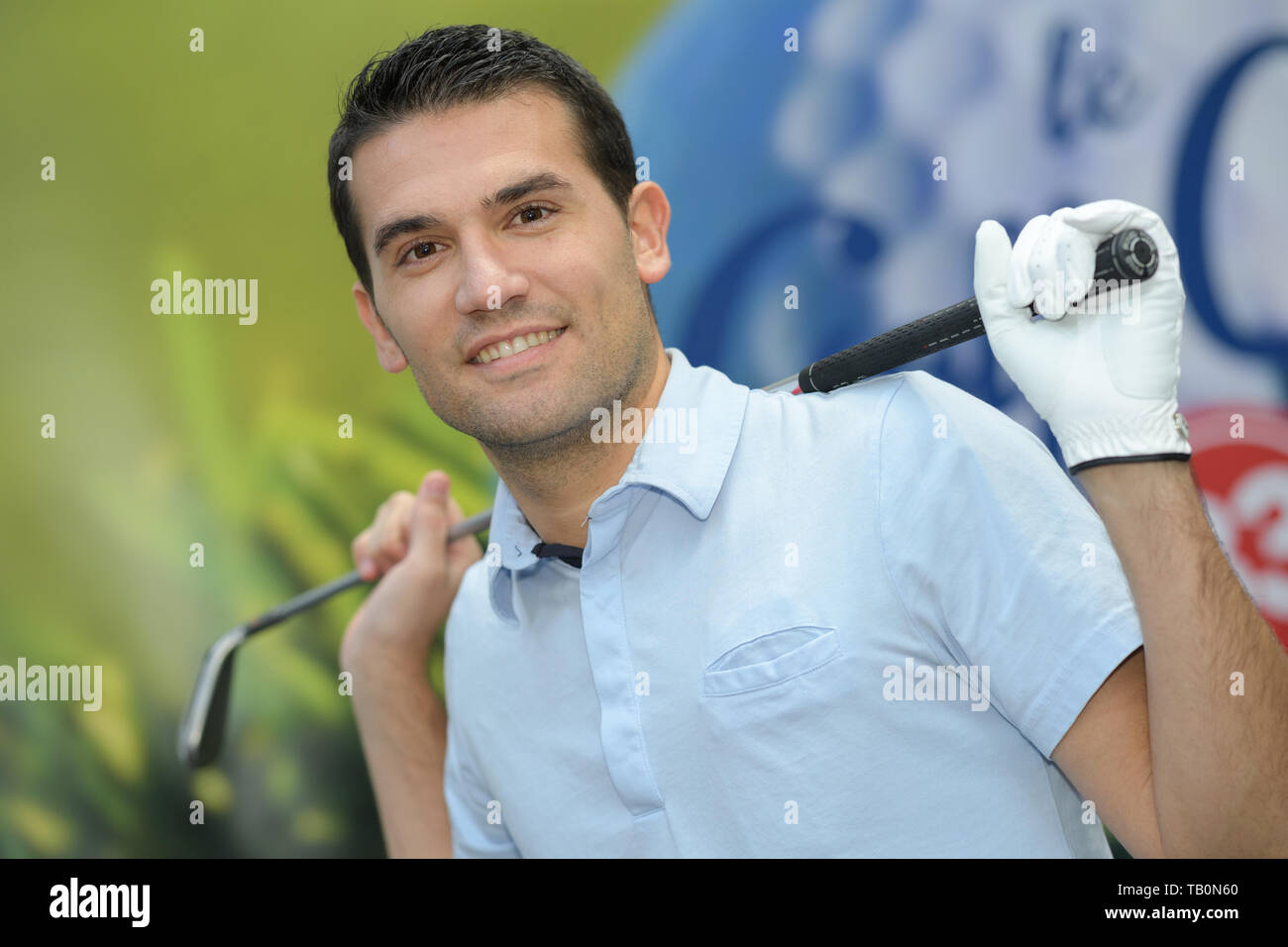 portrait of young handsome male golfer Stock Photo - Alamy
