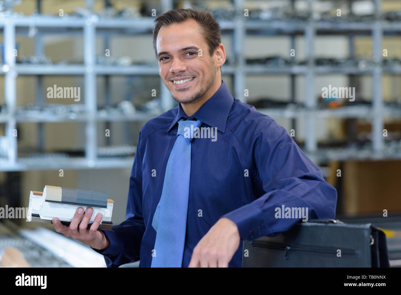 warehouse manager smiling Stock Photo - Alamy