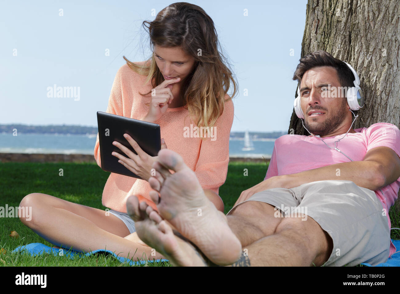 Couple green screen tablet hi-res stock photography and images - Alamy
