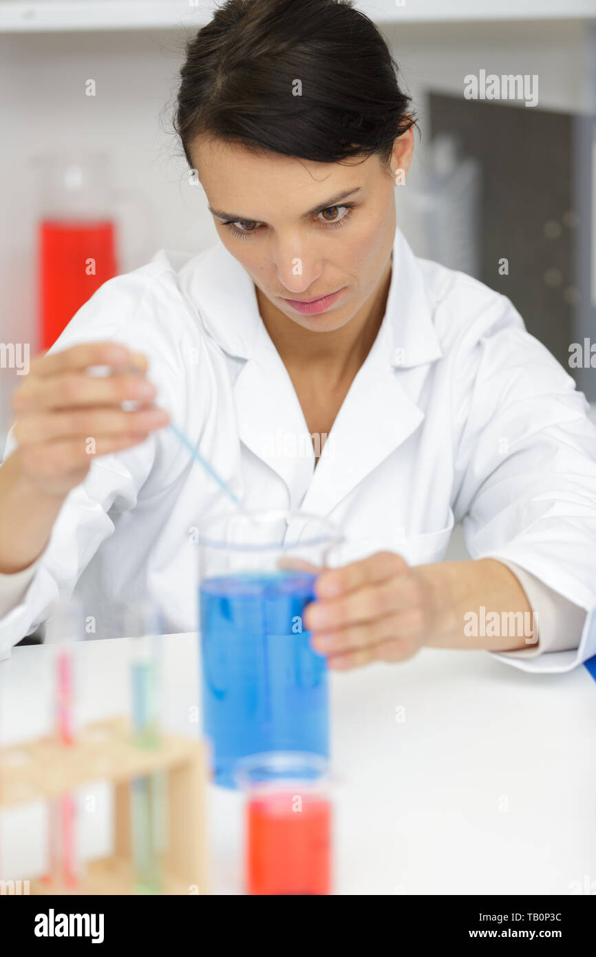 Blue liquid experiment mixing in hi-res stock photography and images ...