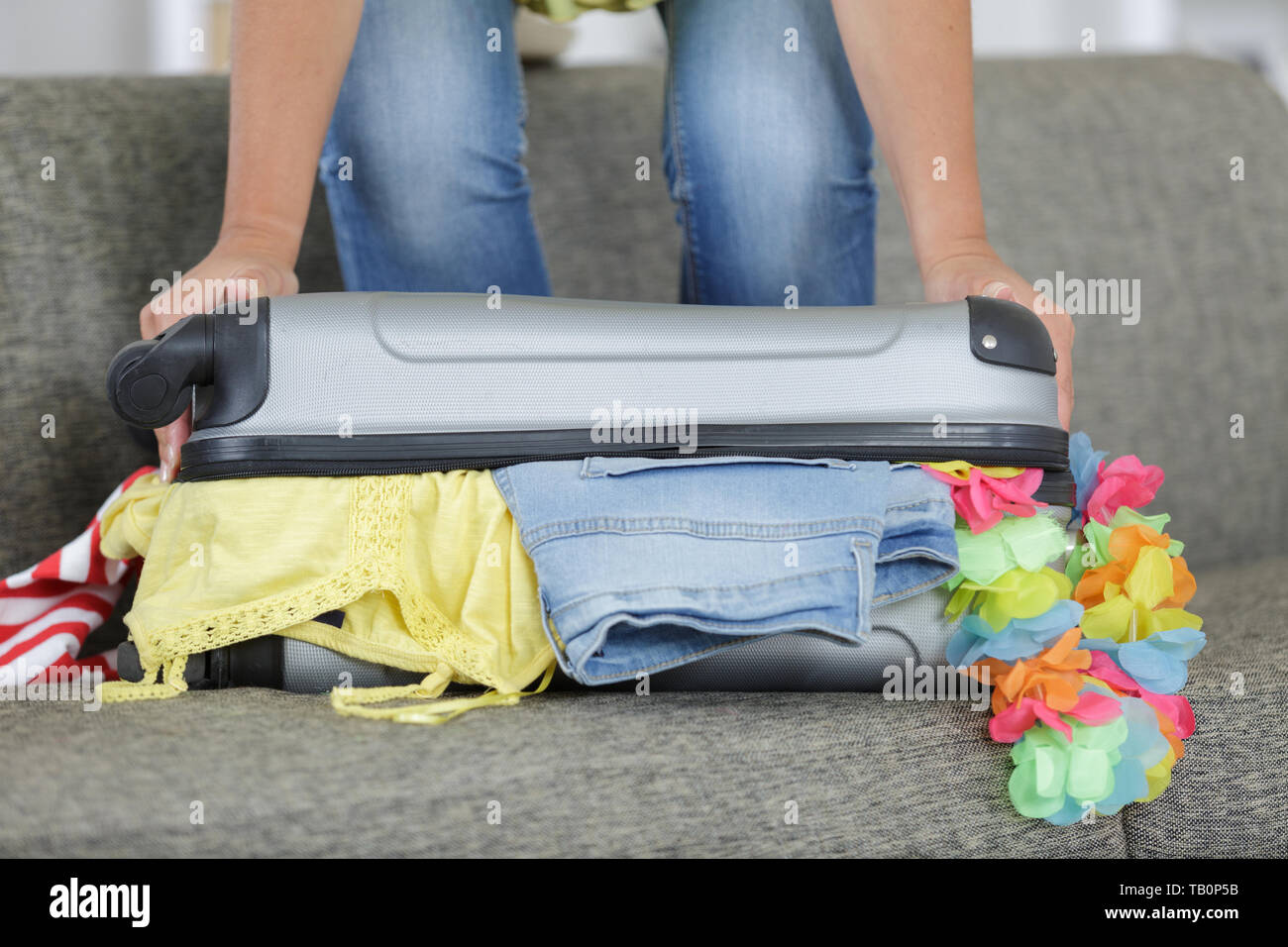 Overflow Suitcase High Resolution Stock Photography and Images - Alamy