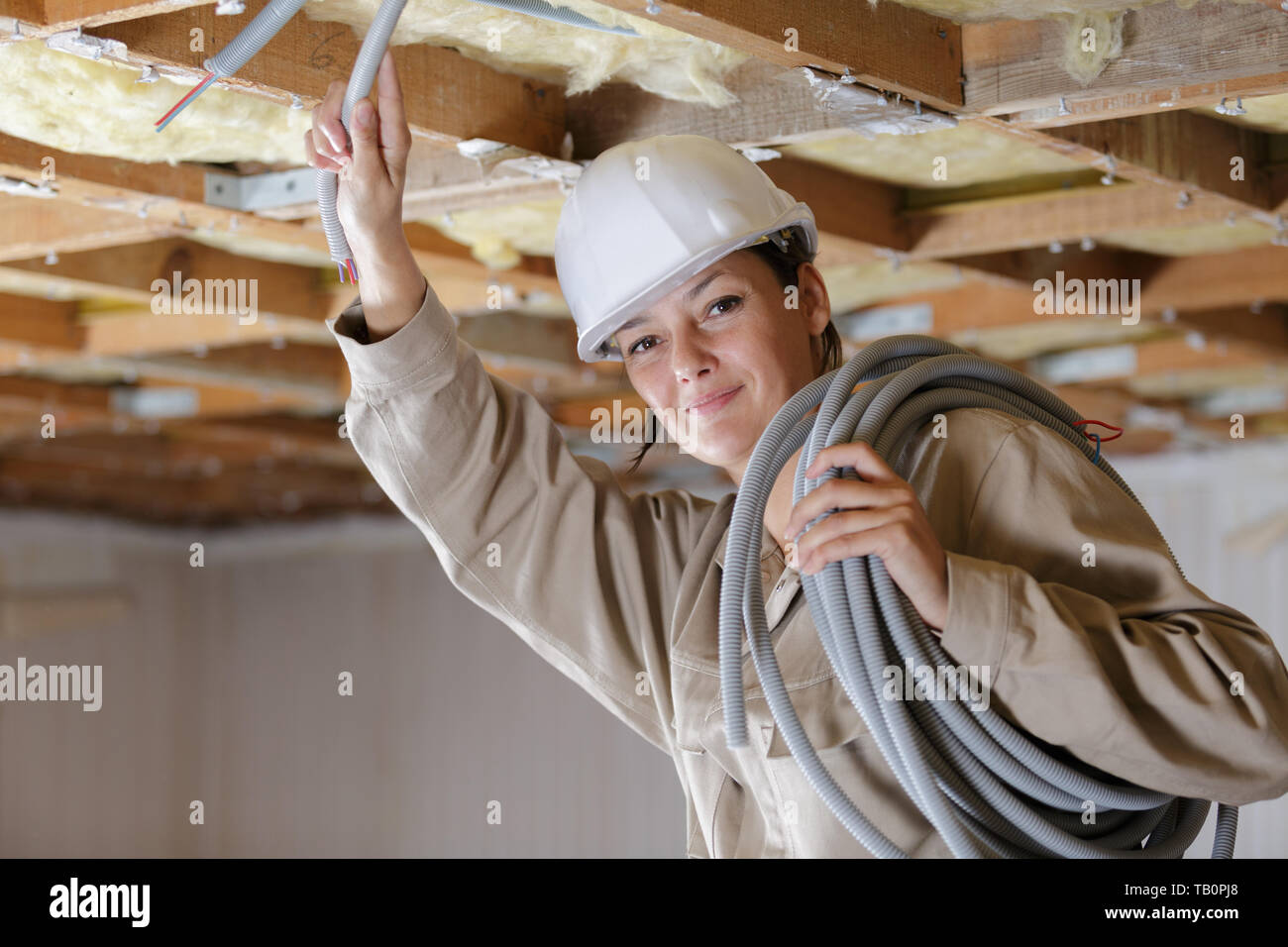 Hand holding electrical wires hi-res stock photography and images - Alamy