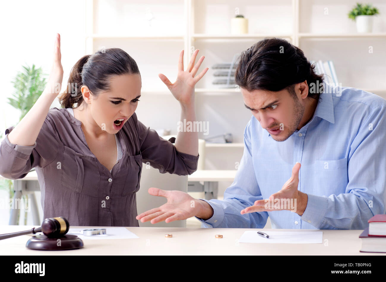 Young family in marriage divorce concept Stock Photo - Alamy