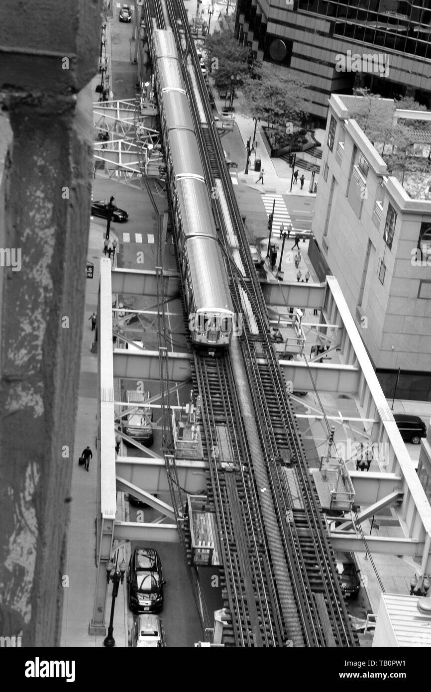 Chicago L train cars from the CTA on elevated tracks in the Loop ...