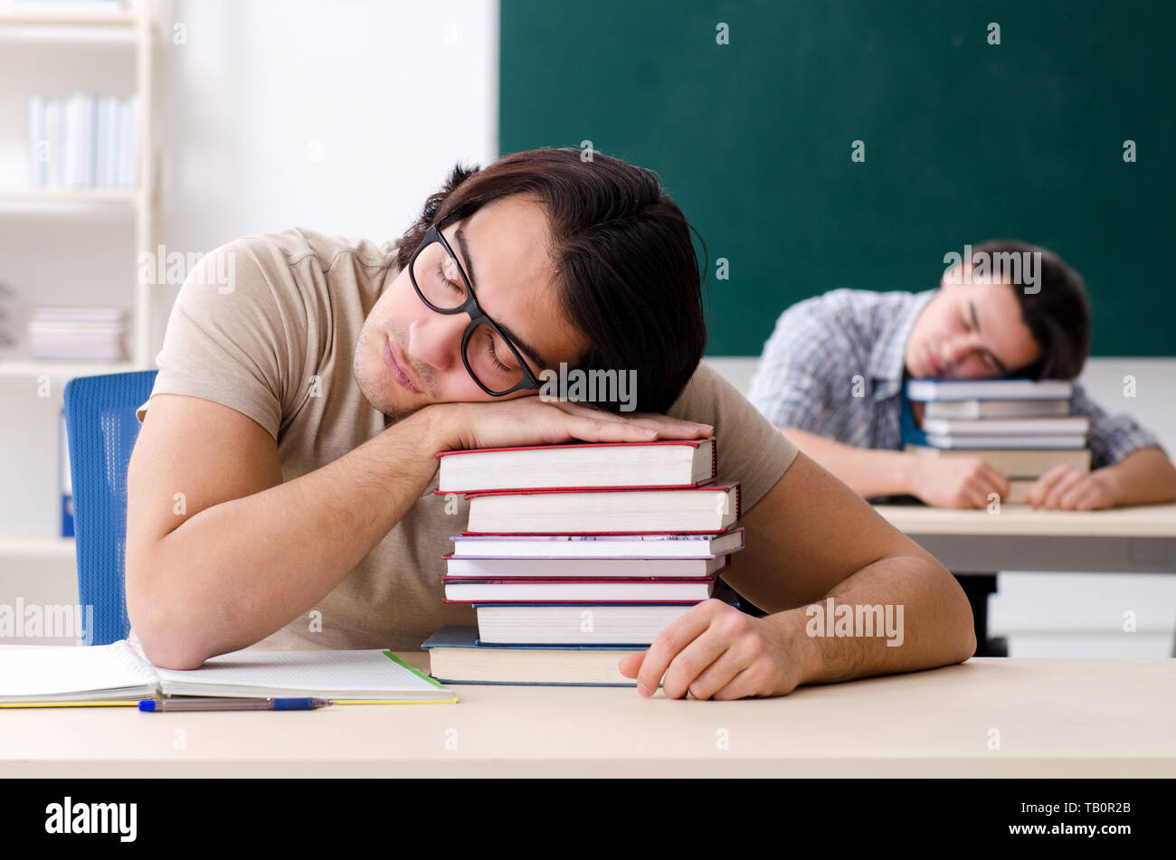 Two male students in the classroom Stock Photo - Alamy