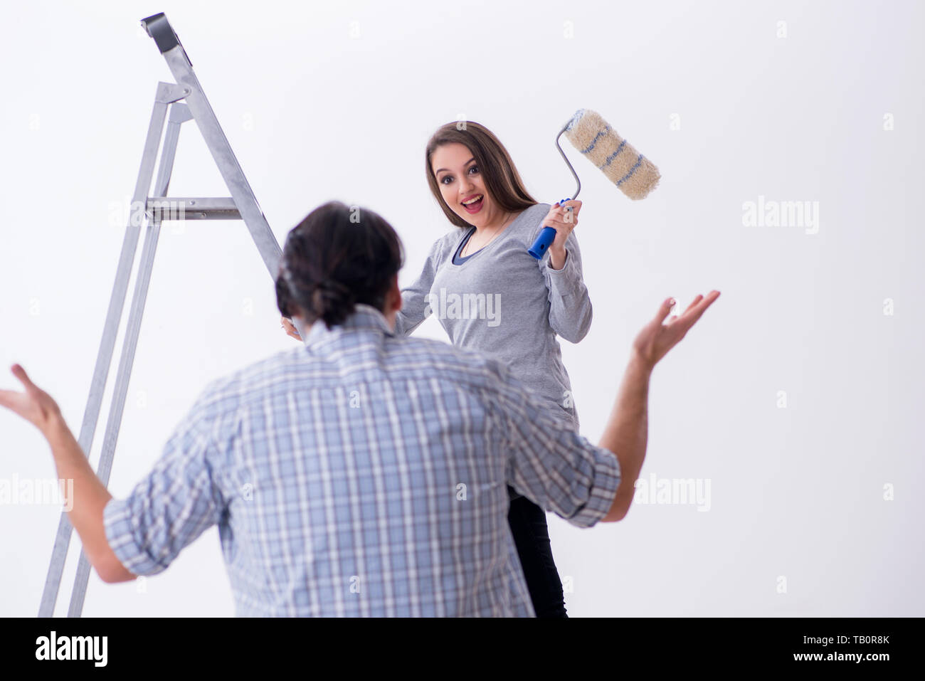 Happy family doing diy hi-res stock photography and images - Alamy