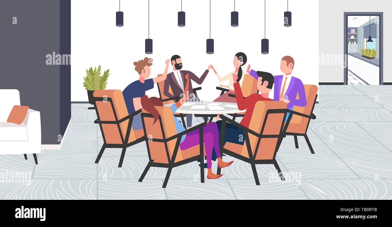 businesspeople group having meeting sitting at round table ...