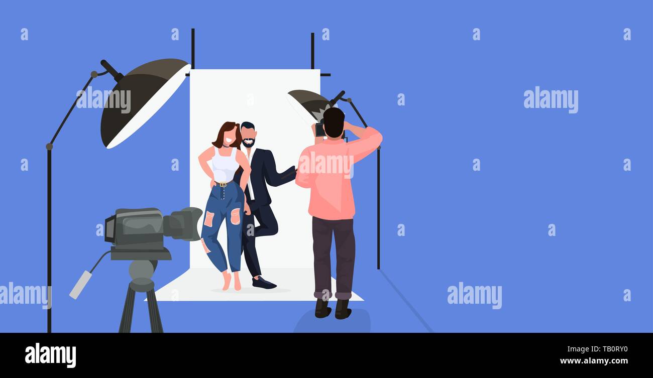 professional photographer using camera man shooting couple standing ...