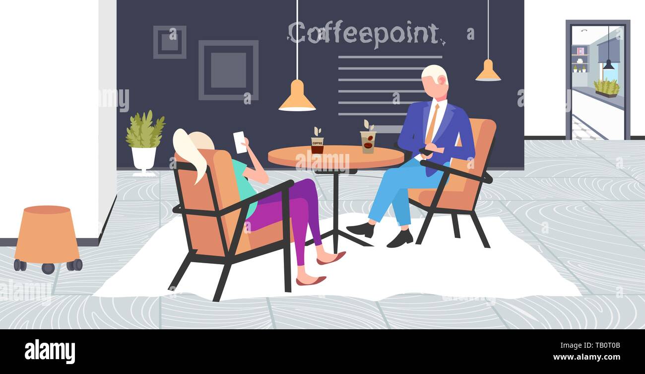 businesspeople using smartphones during corporate break business man ...