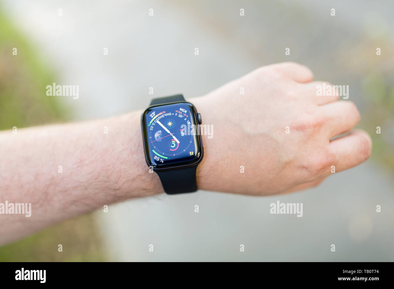 Hand with modern smart watch. Modern gadget that lets you always stay ...