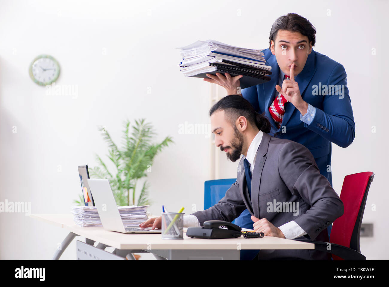 Two male colleagues in the office Stock Photo - Alamy
