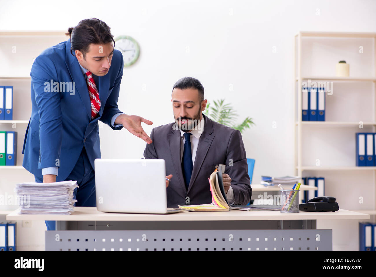 Two male colleagues in the office Stock Photo - Alamy