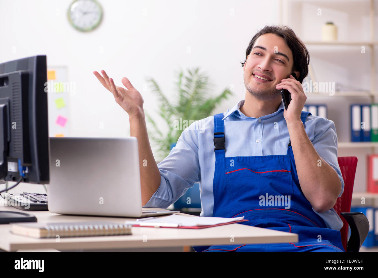 Male it specialist working in the office Stock Photo - Alamy