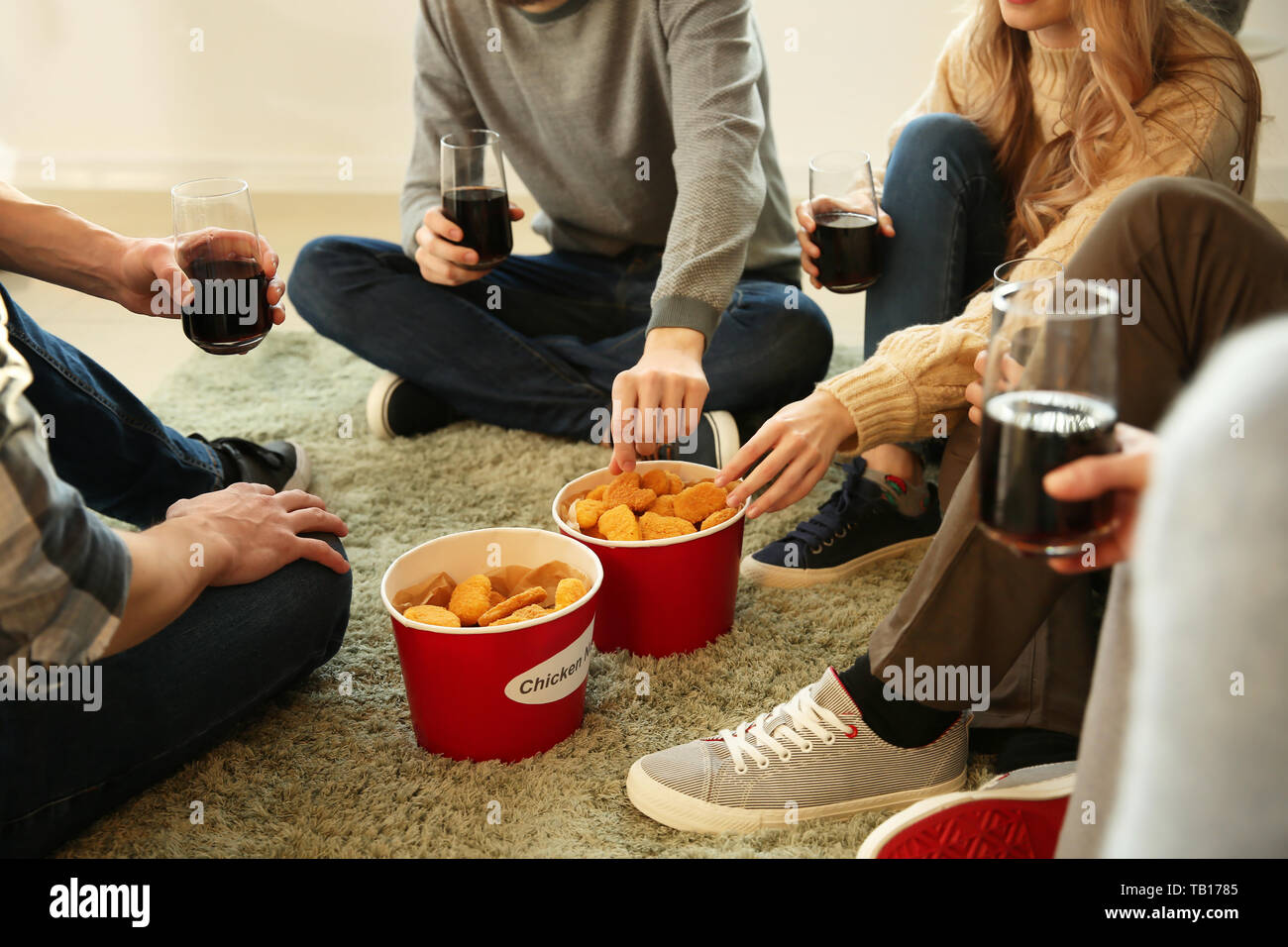 Man eating chicken nuggets hi-res stock photography and images - Alamy