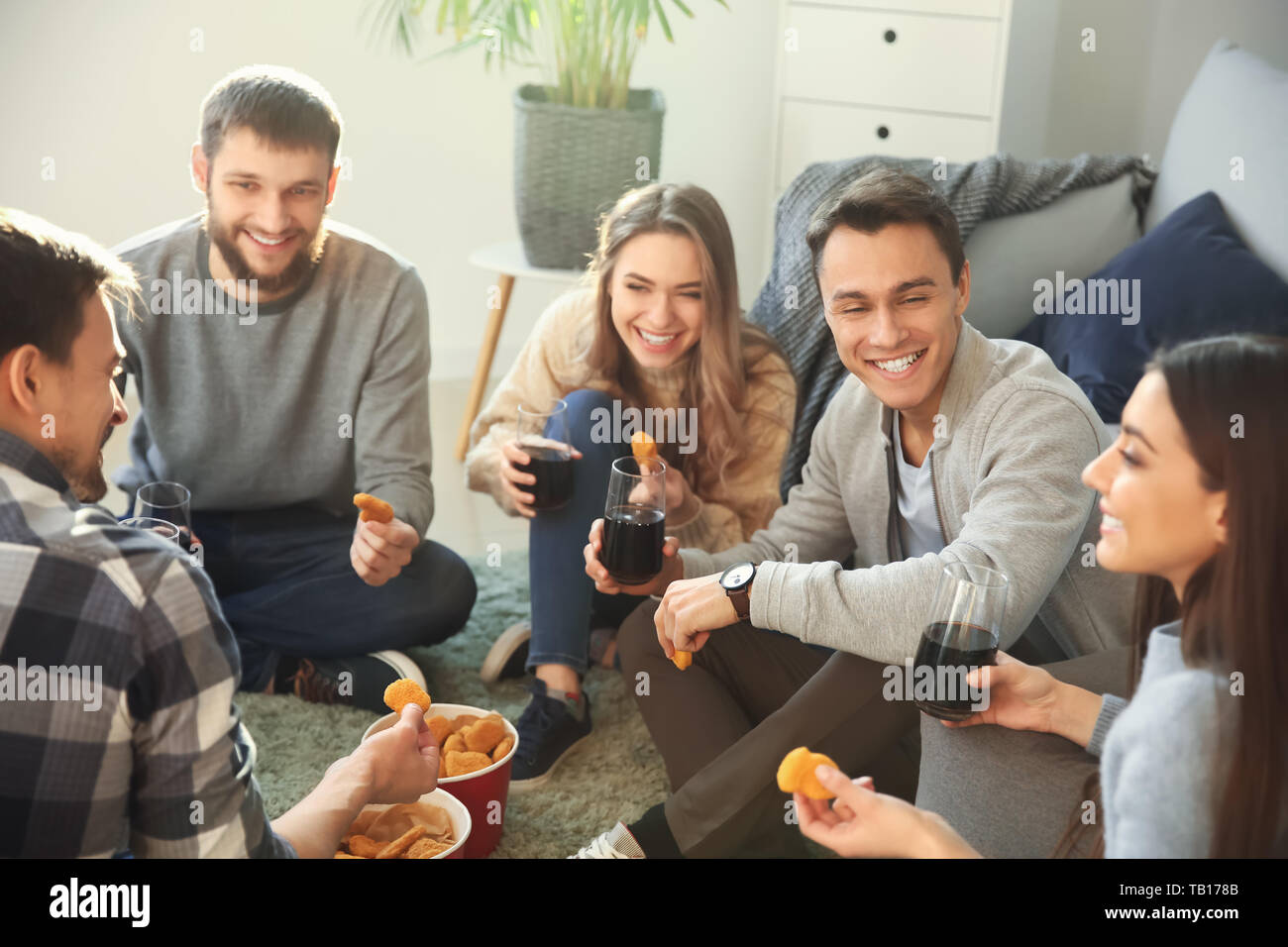 Man eating chicken nuggets hi-res stock photography and images - Alamy