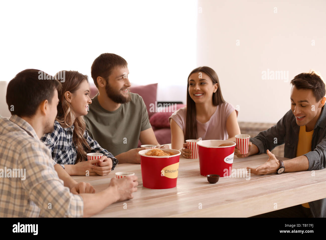Man eating chicken nuggets hi-res stock photography and images - Alamy