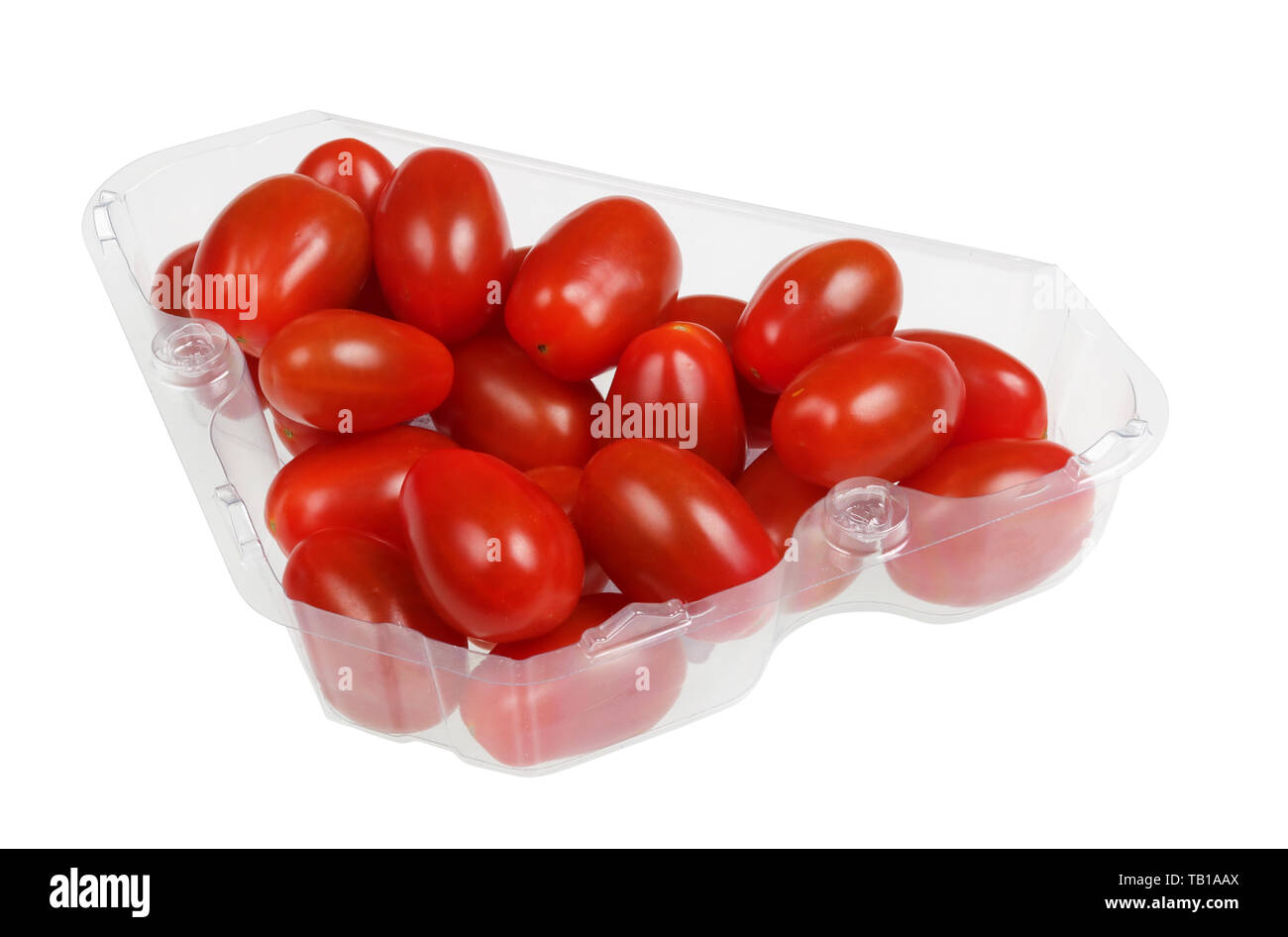 Red cherry oval tomatoes in a clear plastic container.Isolated with patch studio macro shot ...