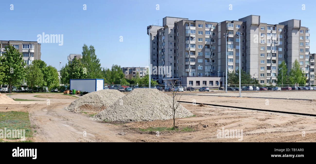 Construction site of a new car parking in a standard residential area ...