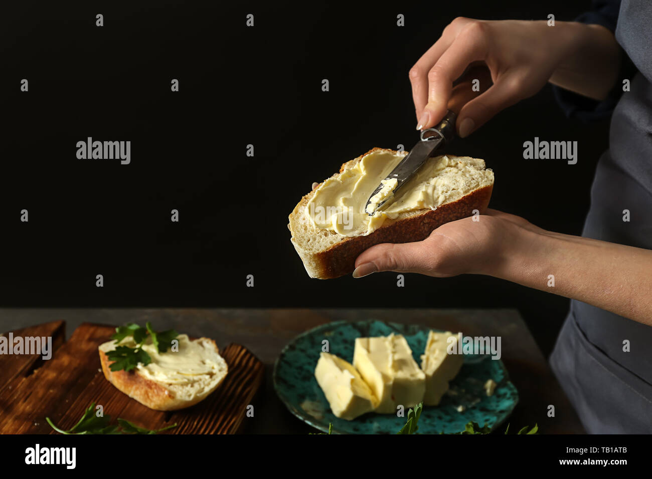 Person spreading bread butter hi-res stock photography and images - Alamy