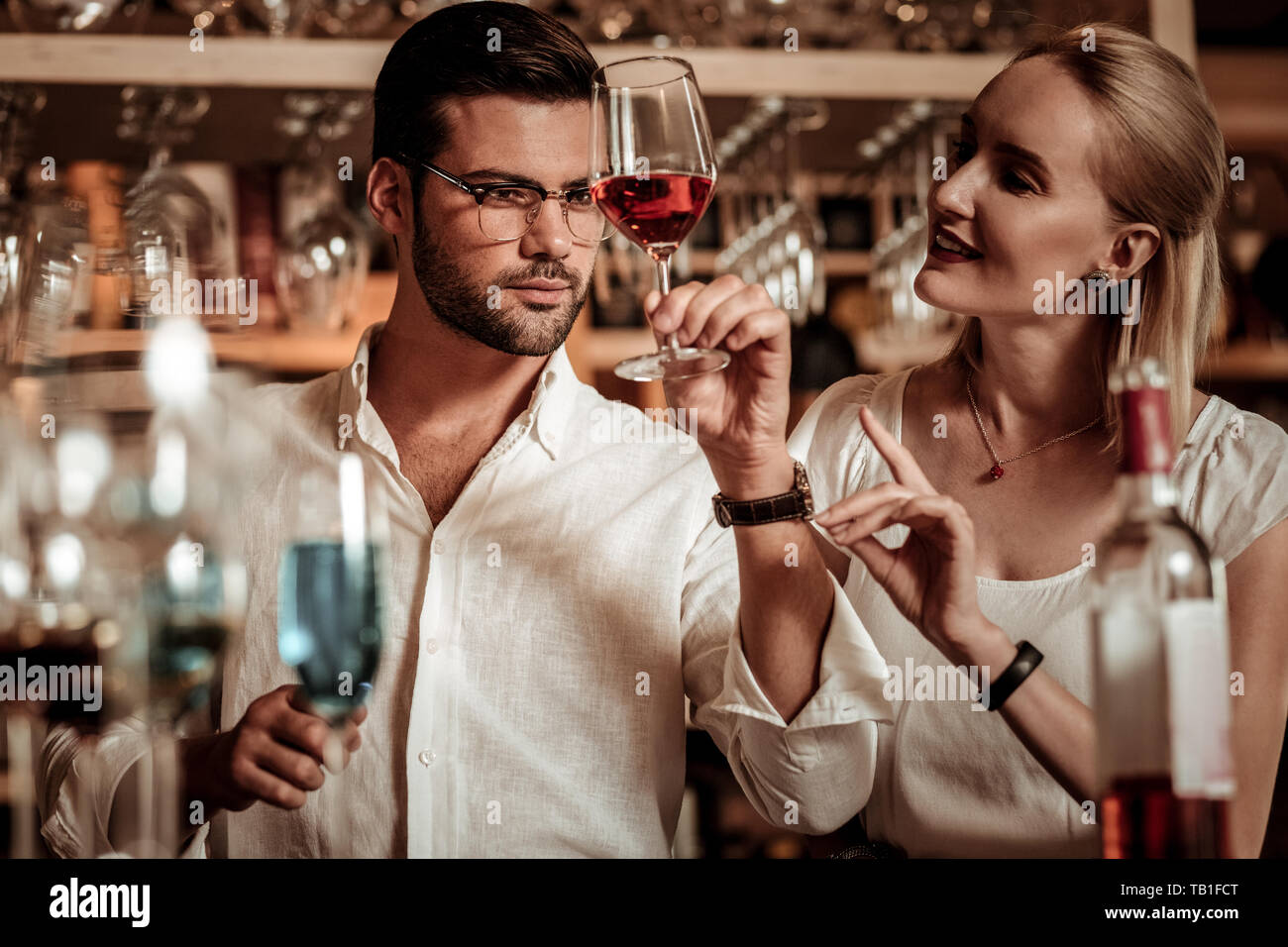 Concentrated brunette male person staring at glass Stock Photo - Alamy