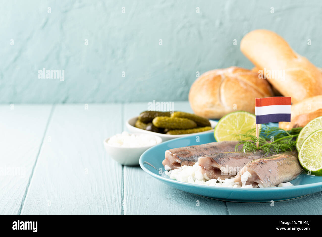 Traditional dutch food herring fish Stock Photo - Alamy