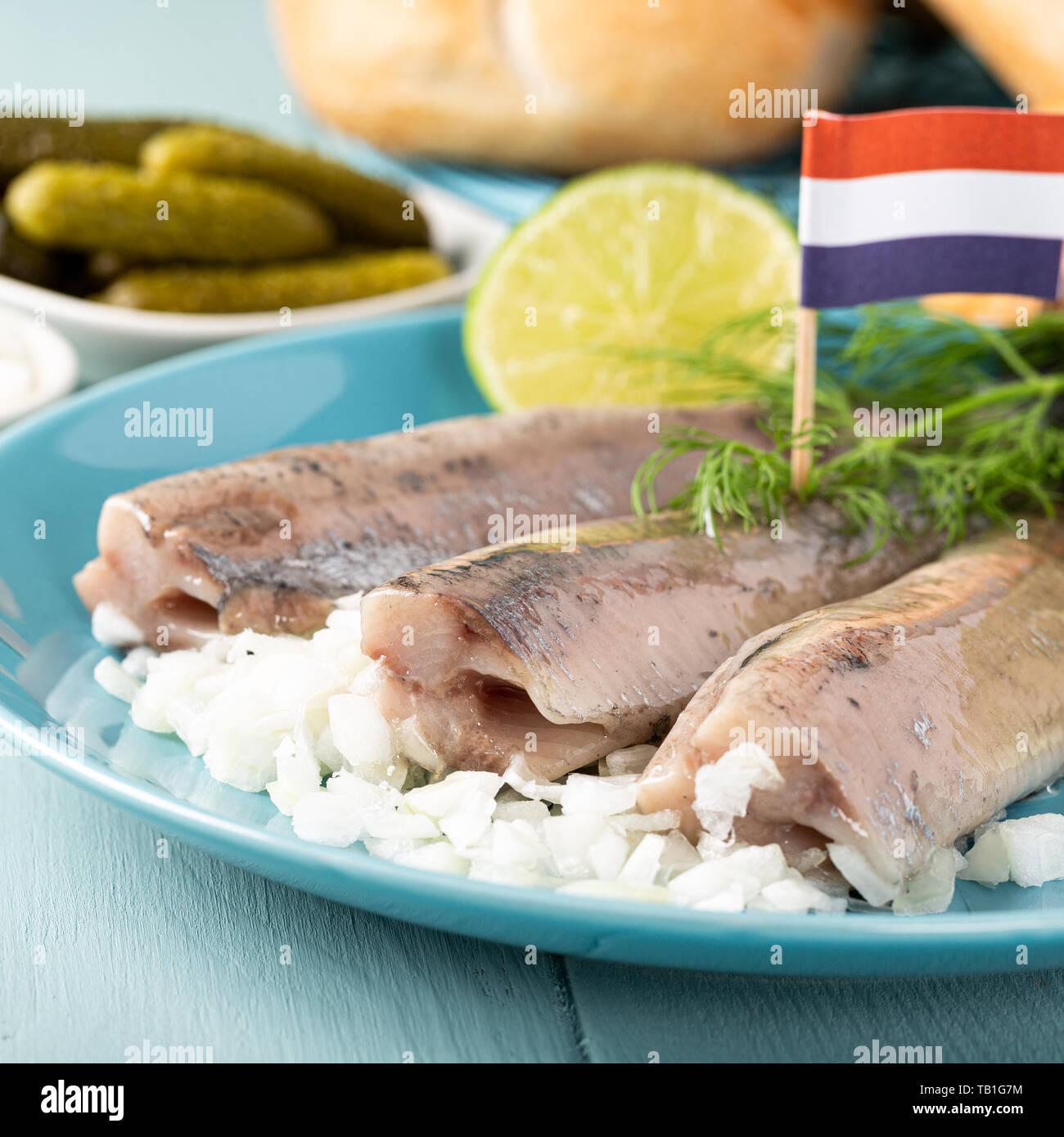 Traditional dutch food herring fish Stock Photo - Alamy