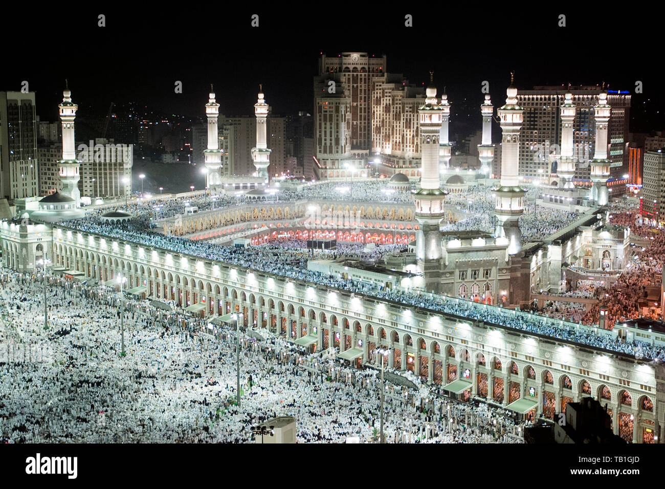 Thousands of Muslims gather around the holy Kaaba, cube at centre, of ...