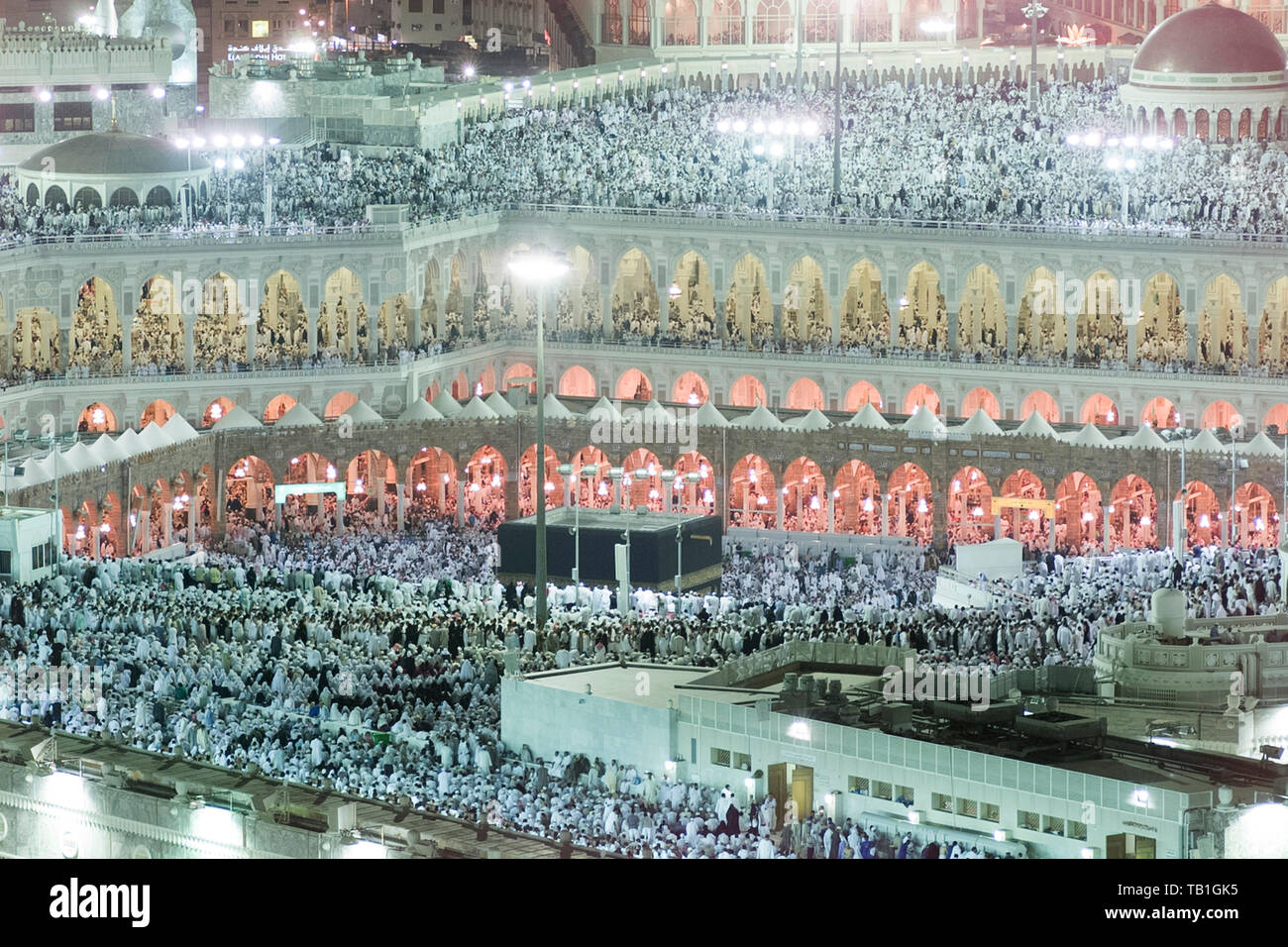 Thousands of Muslims gather around the holy Kaaba, cube at centre, of ...