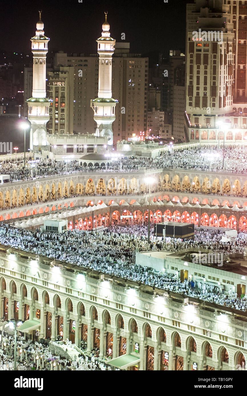 Thousands of Muslims gather around the holy Kaaba, cube at centre, of ...
