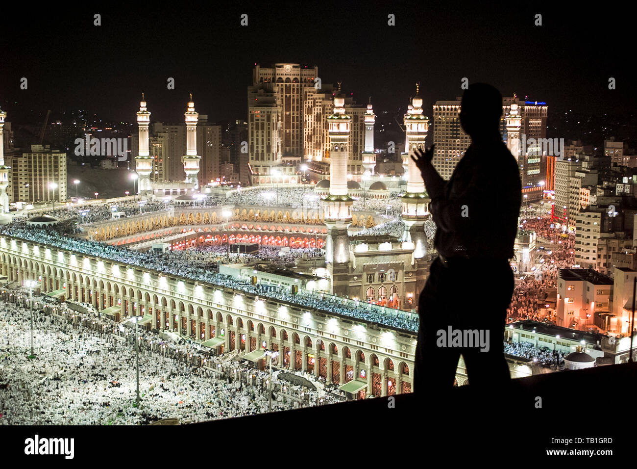 Thousands of Muslims gather around the holy Kaaba, cube at centre, of ...