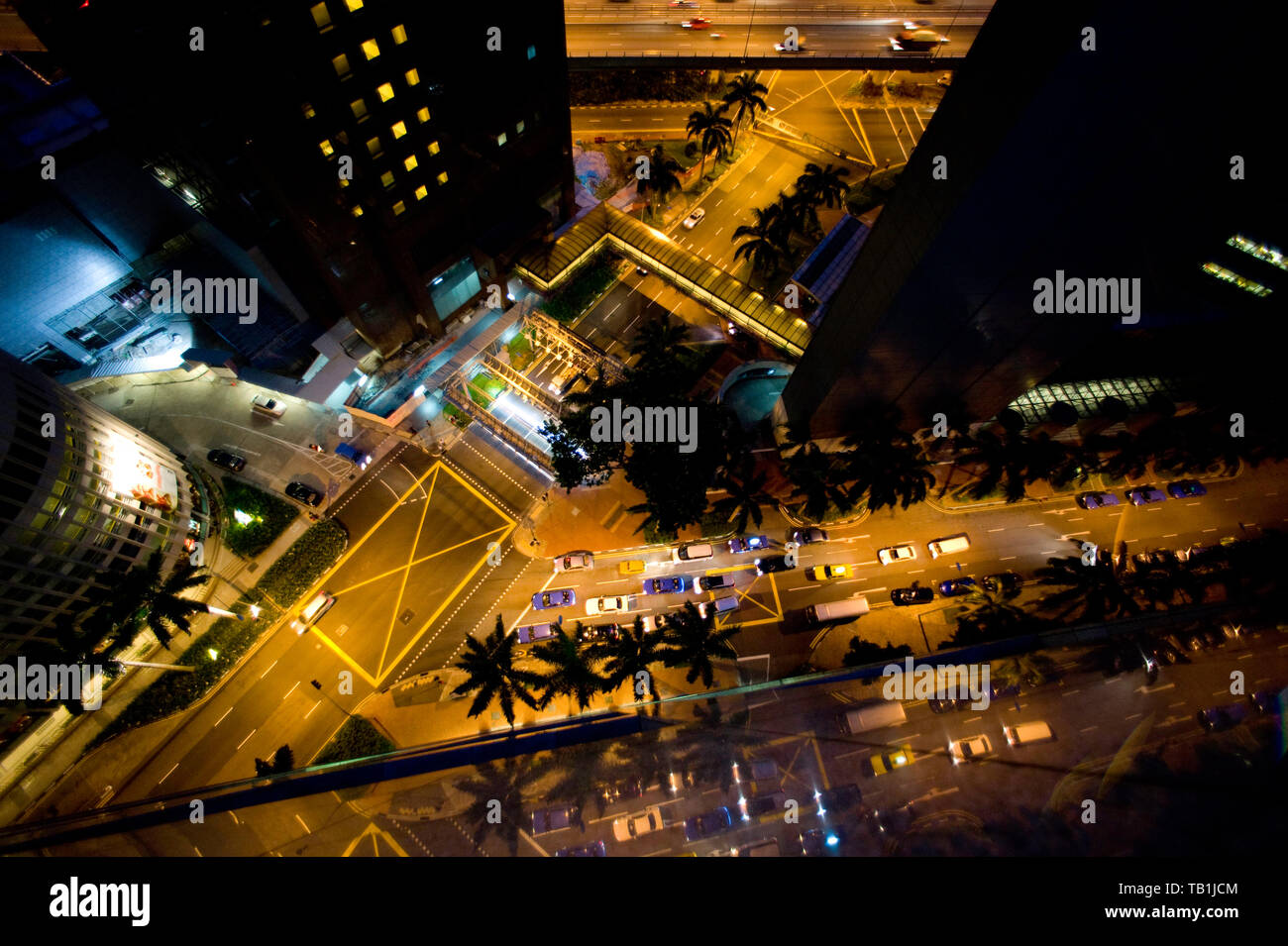 Top down shot looking down onto the road and city scape from a high ...