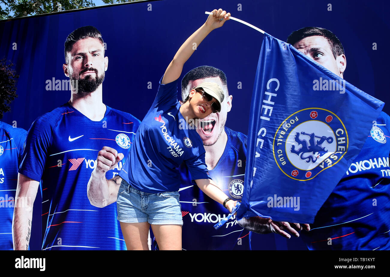A Chelsea fan poses for a picture prior to the UEFA Europa League final ...