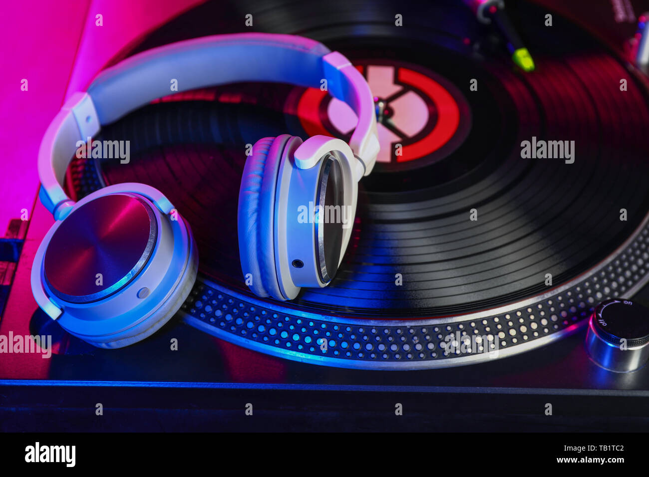 Headphones on modern DJ mixer, closeup Stock Photo - Alamy