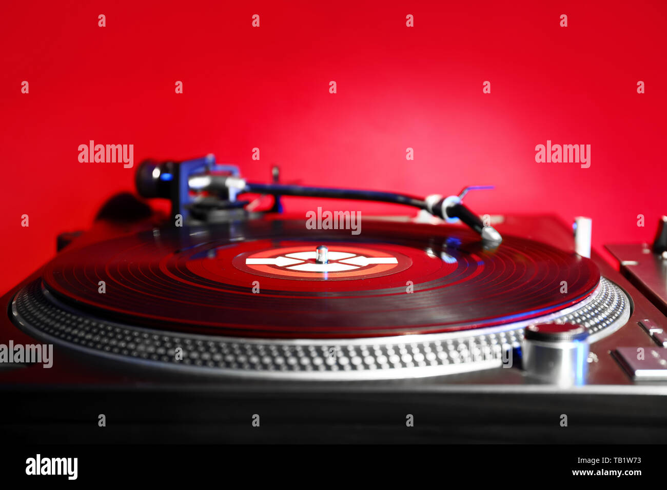Modern DJ mixer on color background Stock Photo - Alamy