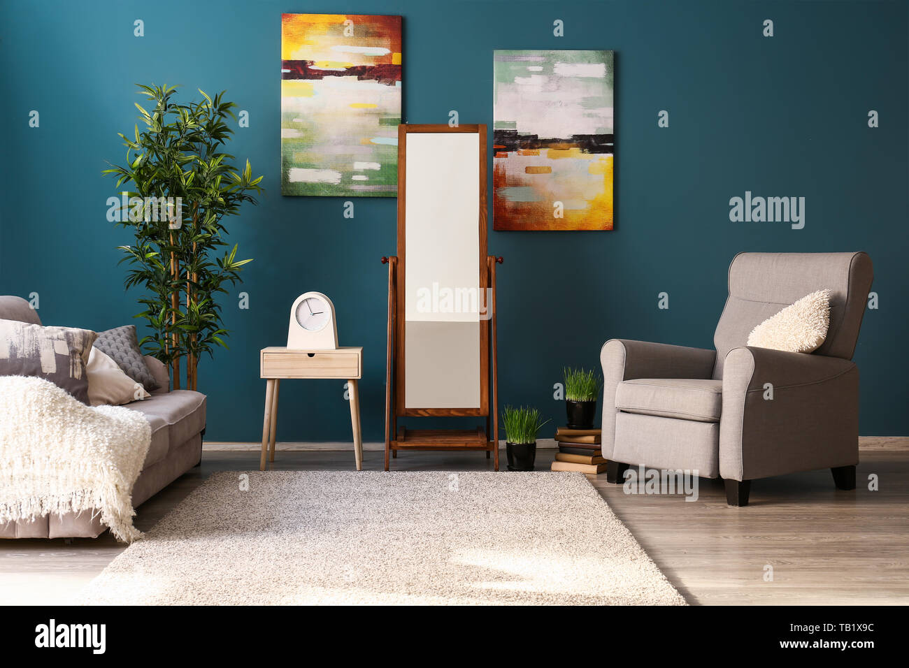 Interior of beautiful room with big mirror Stock Photo - Alamy